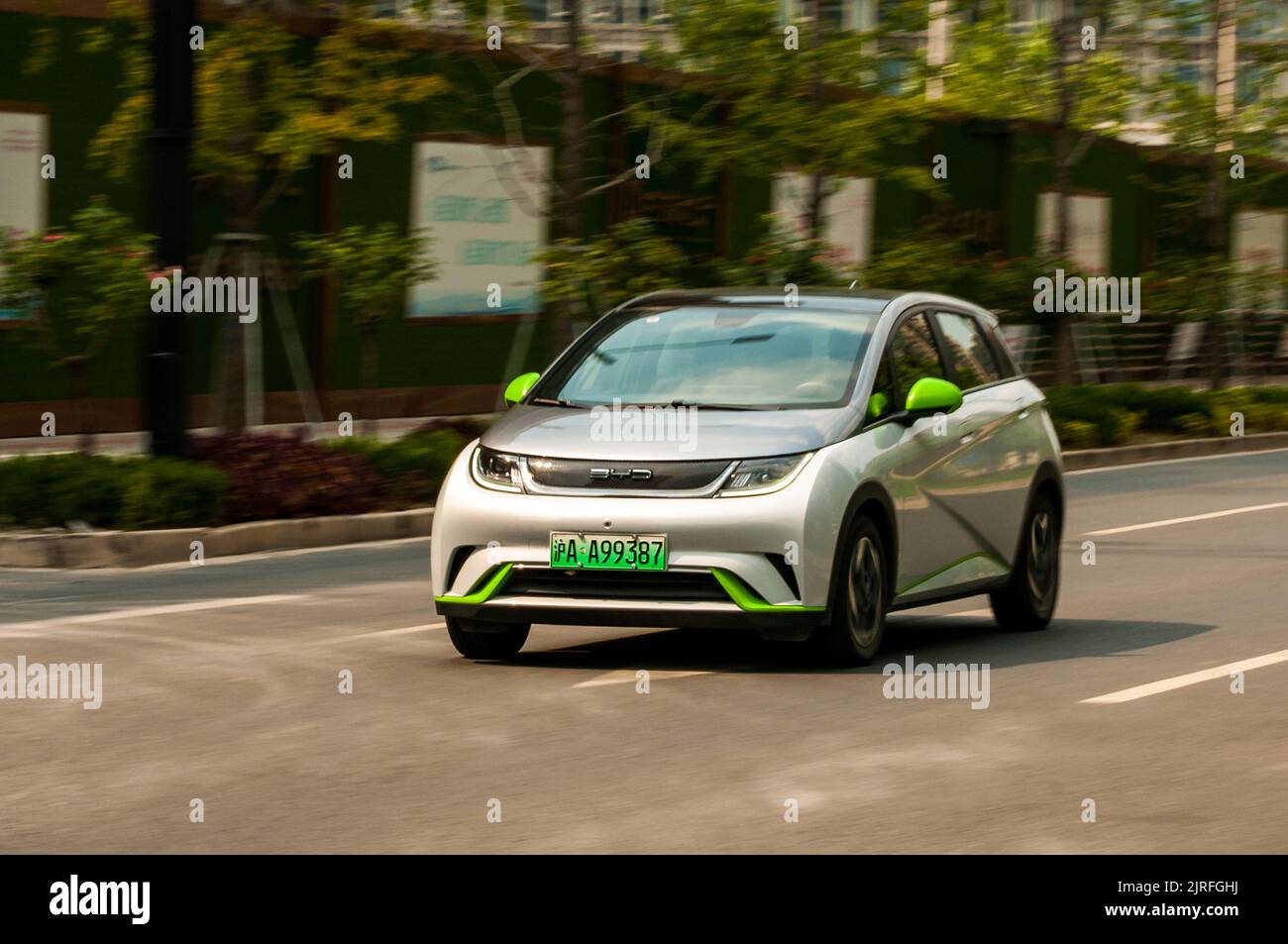 BYD Dolphin small electric hatchback car being driven on the road in ...