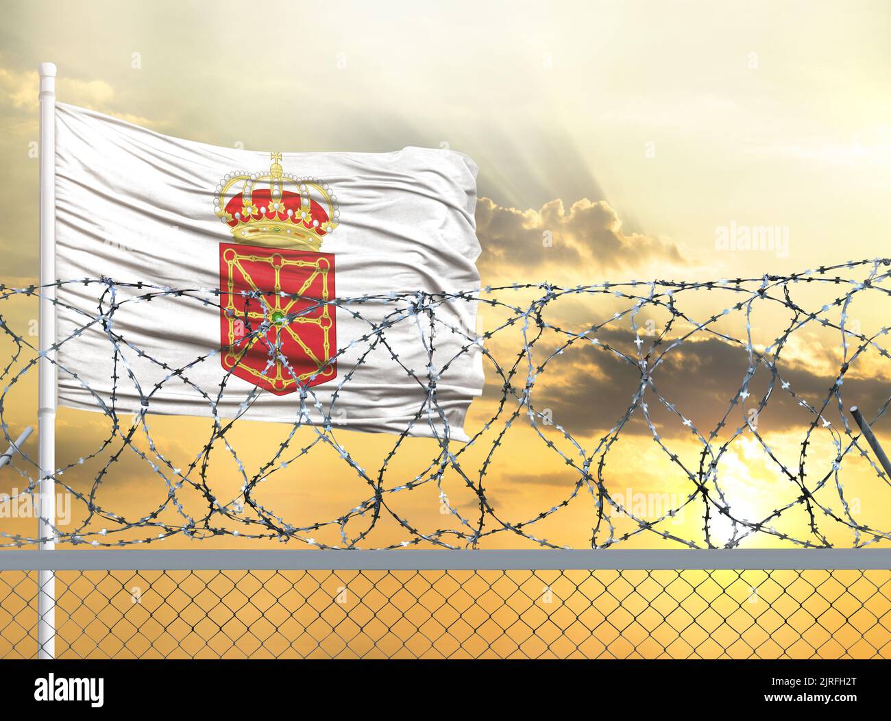 Flagpole with the flag of Navarra coat of arms against the sky and ...
