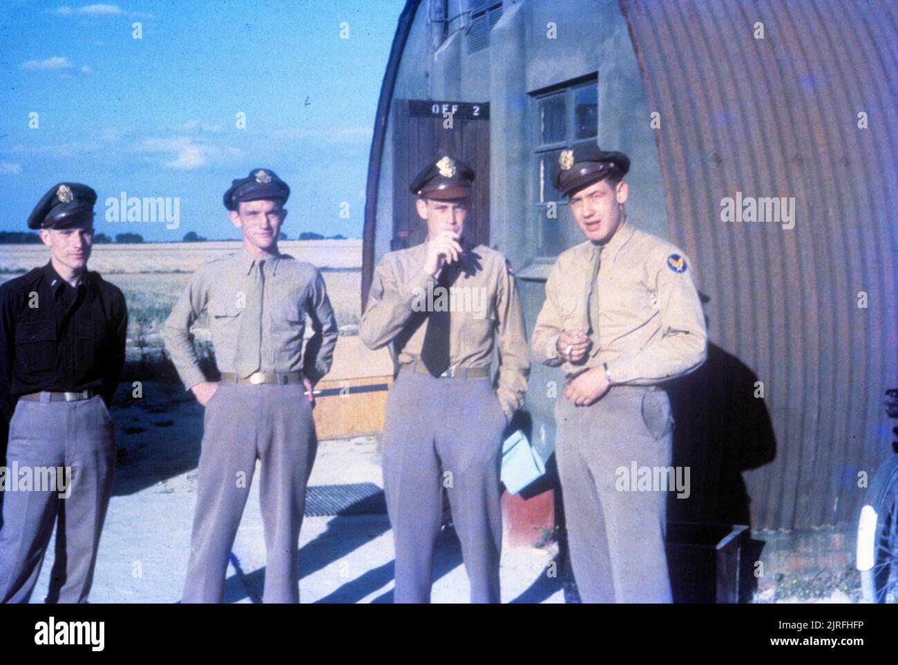 Four United States Army Air Force officers standing in front of a ...