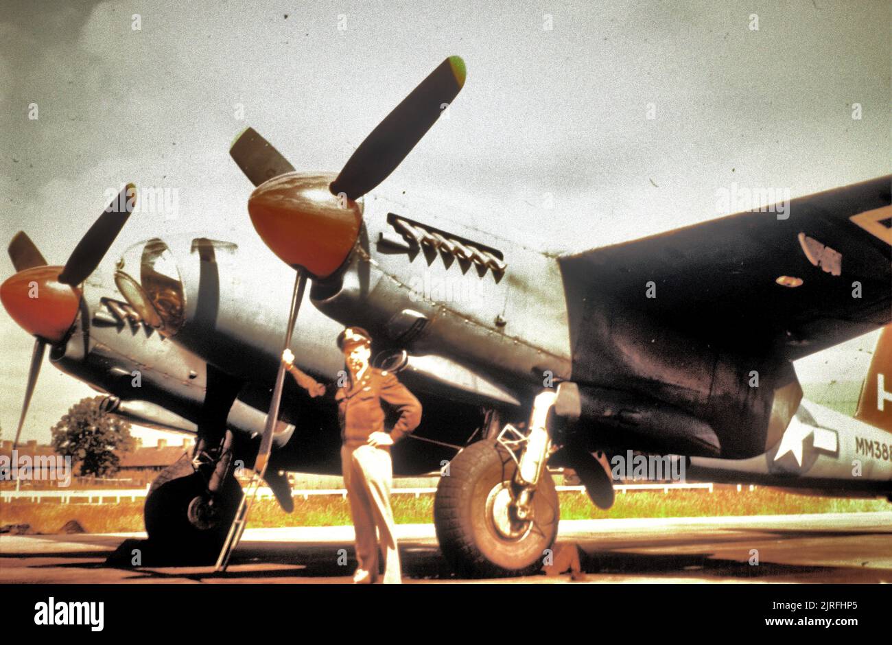 An airman of the 25th Bomb Group with a Mosquito (H, serial number MM ...