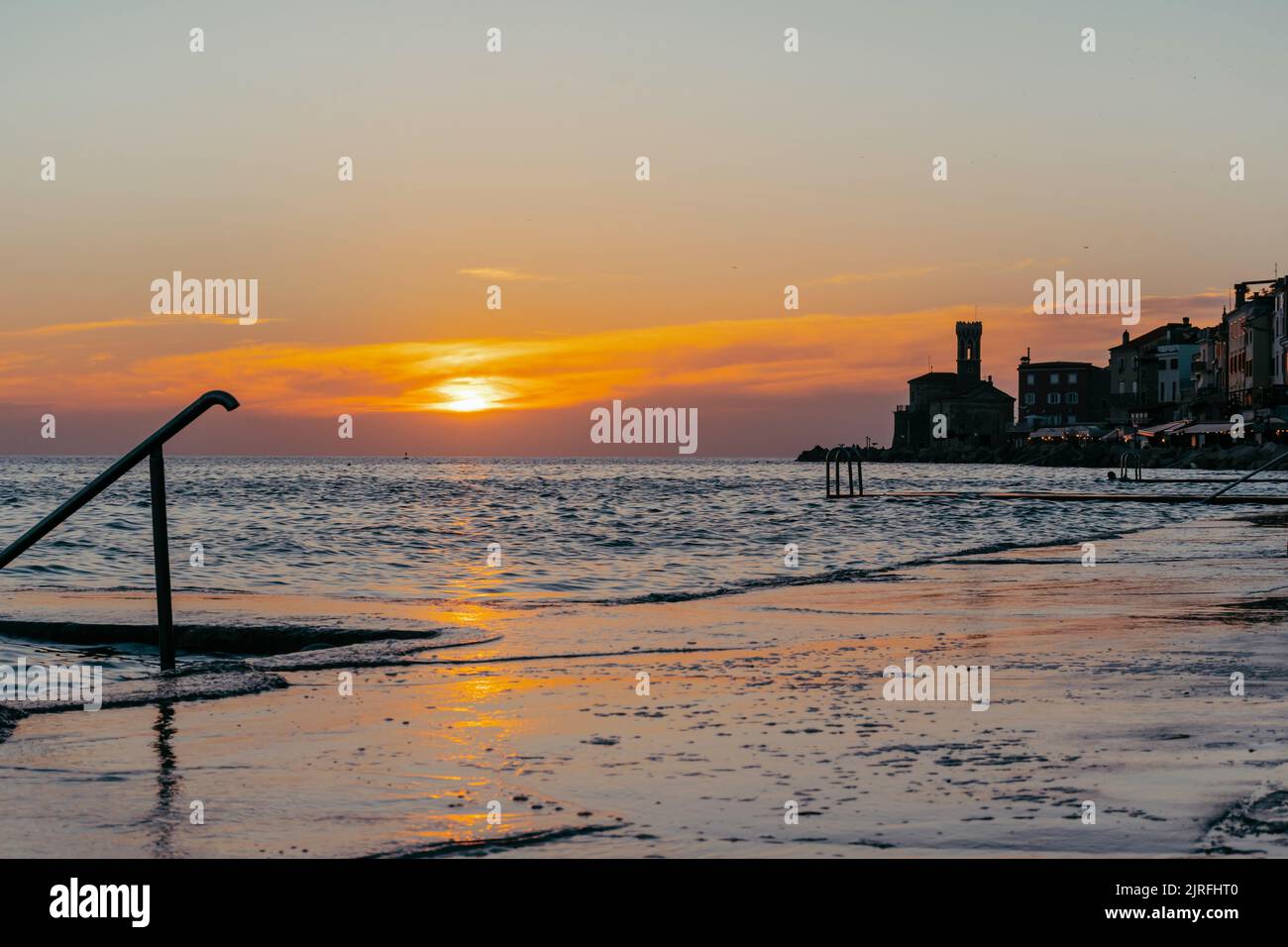 An aerial view of sea surrounded by buildings in Piran Stock Photo - Alamy
