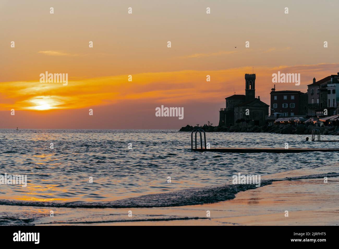 An aerial view of sea surrounded by buildings in Piran Stock Photo - Alamy