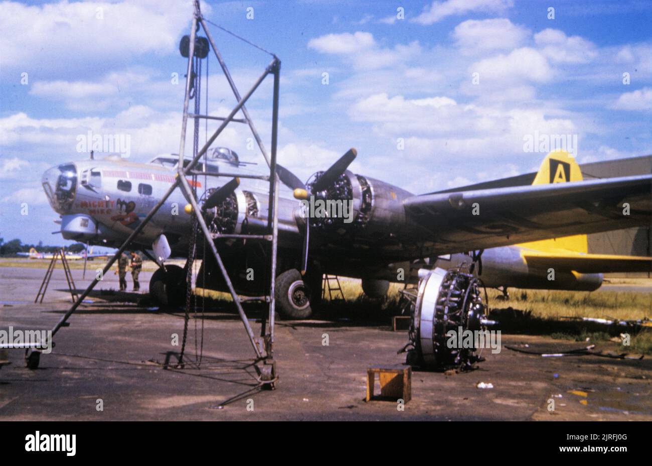 Ground personnel of the 94th Bomb Group work on a B-17 Flying Fortress ...