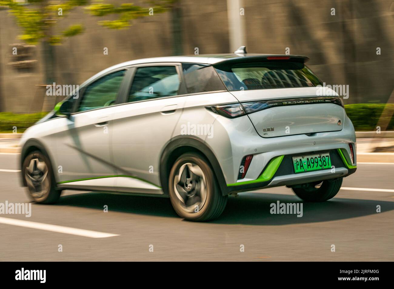 BYD Dolphin small electric hatchback car being driven on the road in ...