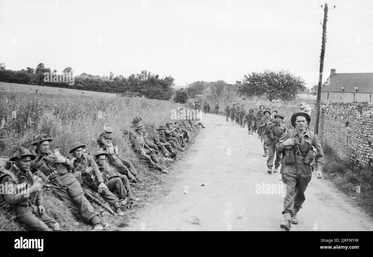Infantry of 50th Division moving forward near St Gabriel, Normandy, 6 ...