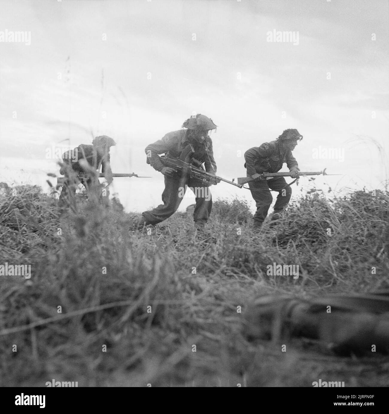 Infantry of 8 Rifle Brigade (Motor), 11th Armoured Divsion, move ...