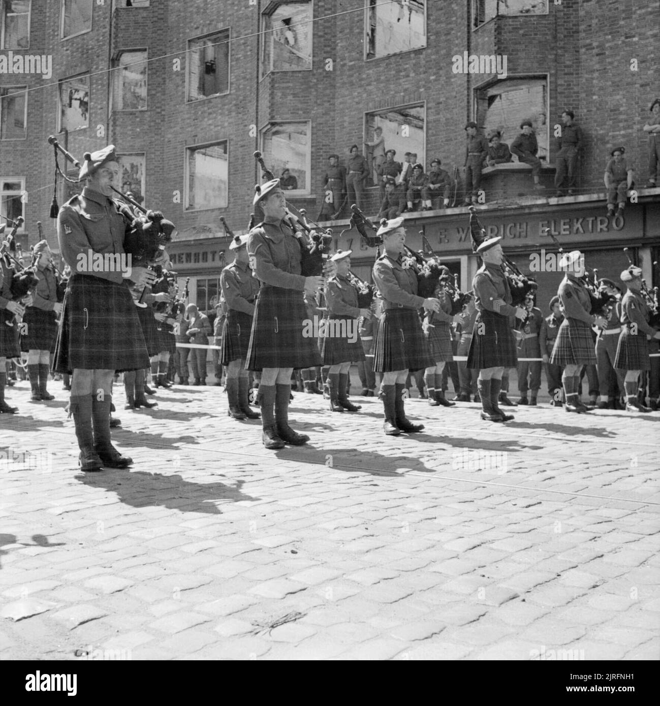 Pipers of the 51st Highland Division play during the ceremony to mark ...