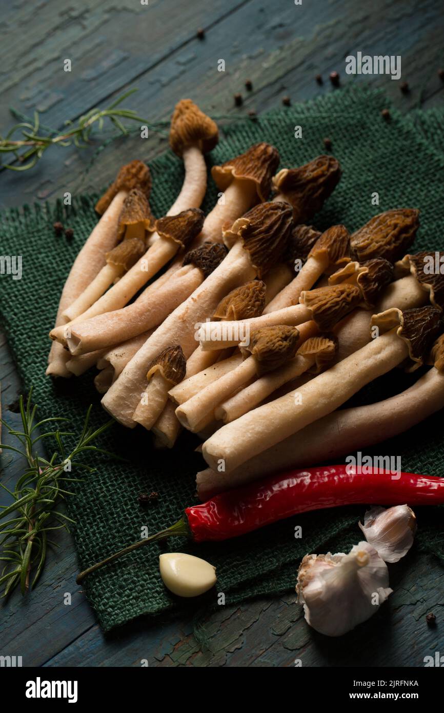 Morel forest mushrooms with spicy spices and aromatic vegetables Stock ...