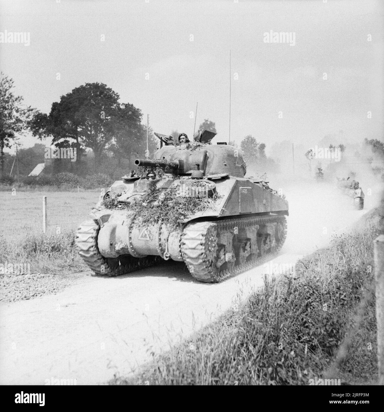 Sherman tanks advancing towards Vire, Normandy, 2 August 1944. Sherman ...