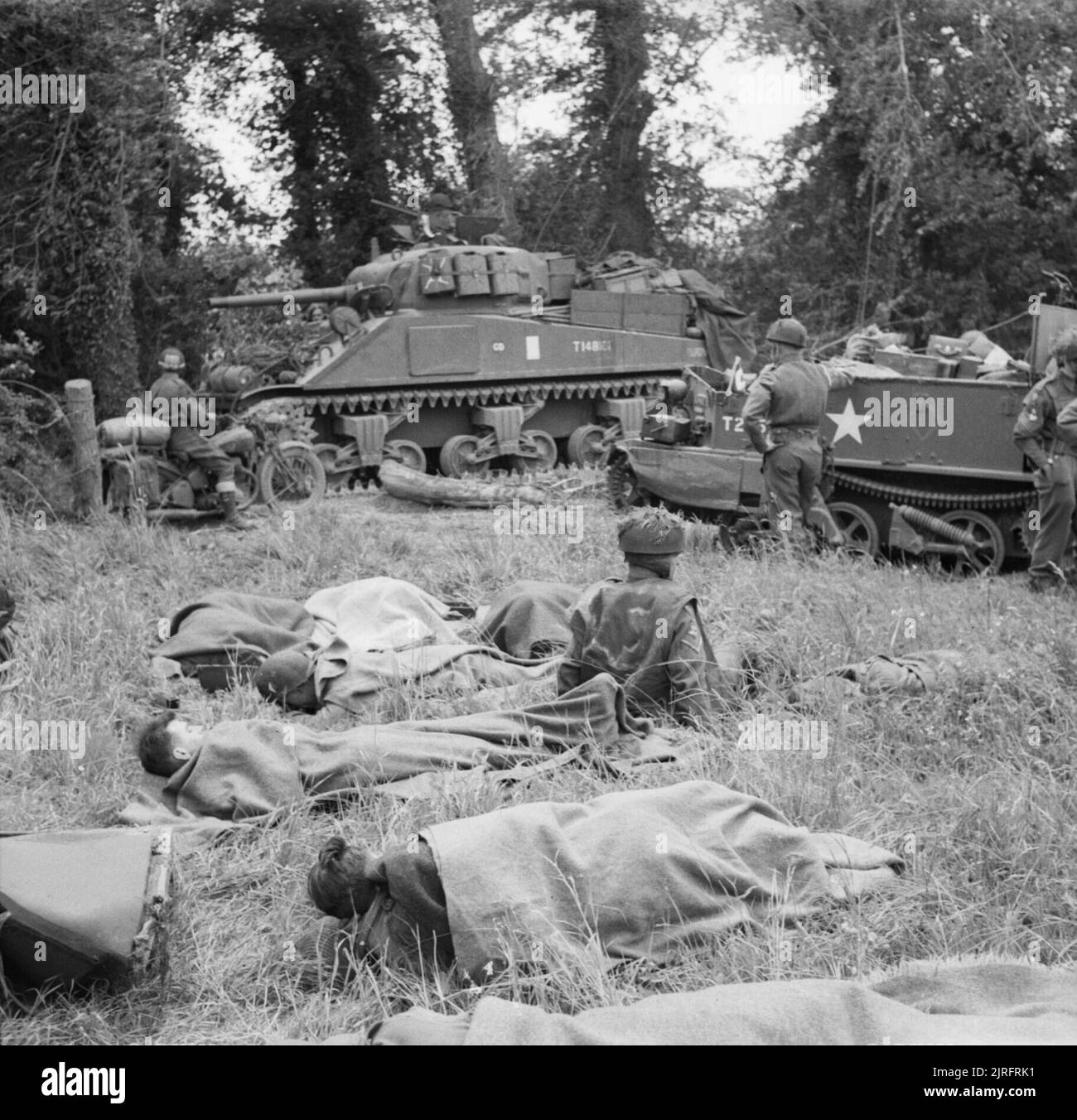 The British Army in Normandy 1944 A Sherman tank and Universal carrier ...
