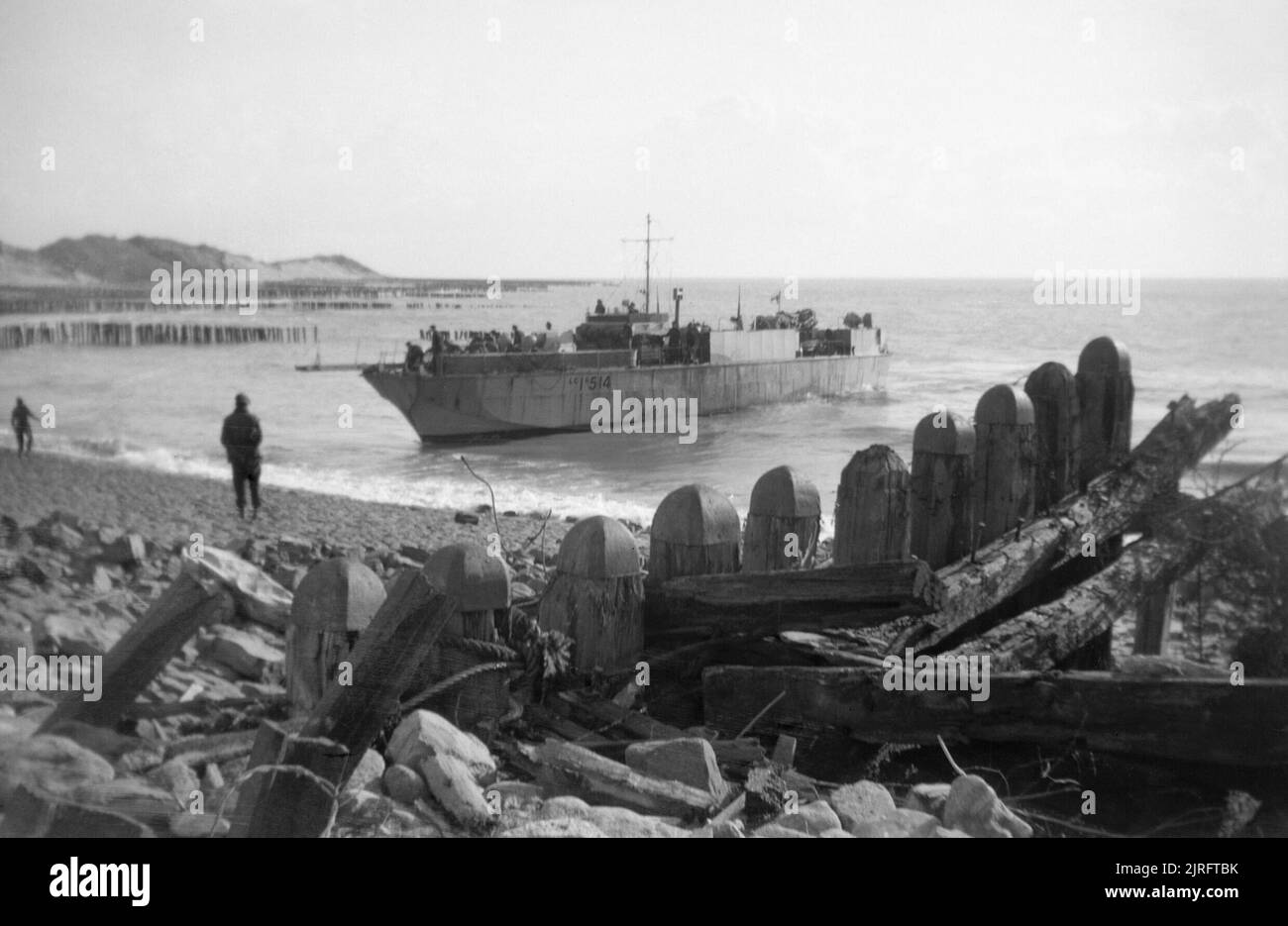 An infantry landing craft (LCI) approaching the shore to take off ...