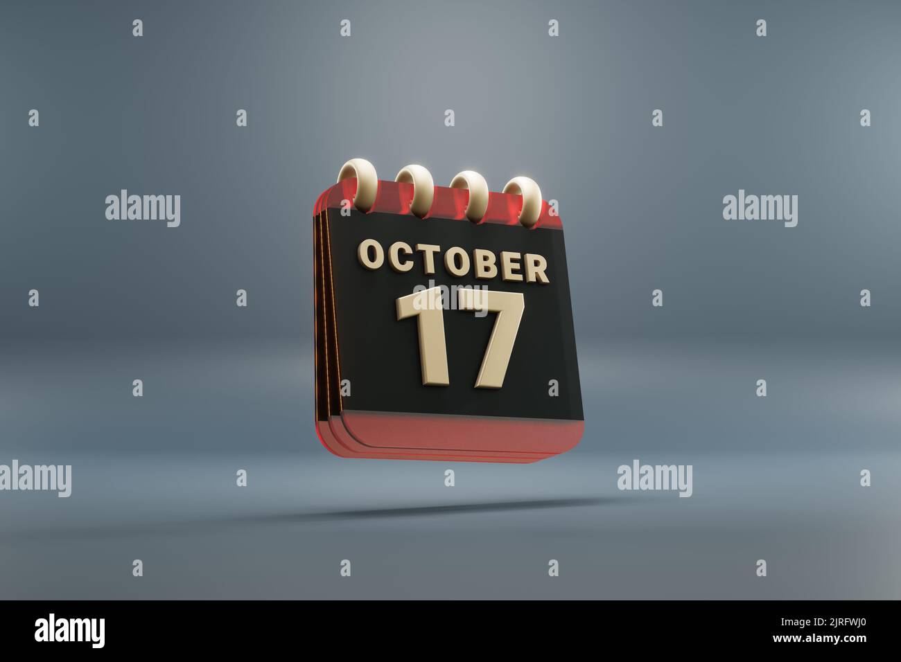 Standing black and red month lined desk calendar with date October 17 ...