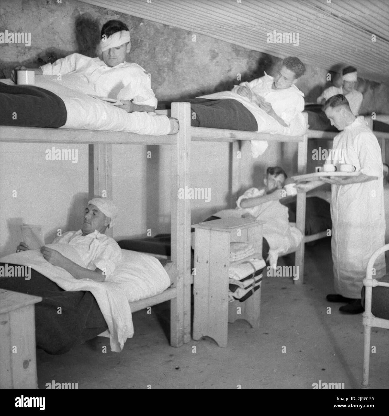 The British Army on Gibraltar 1941 'Patients' rest on bunks during a ...