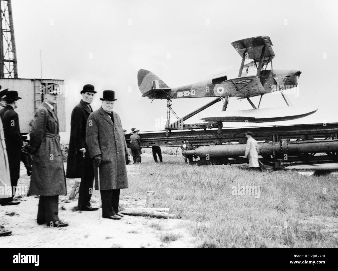 Winston Churchill and the Secretary of State for War waiting to see the ...