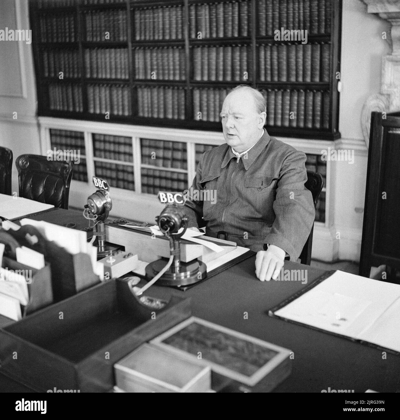 Winston Churchill makes a radio address from his desk at 10 Downing ...