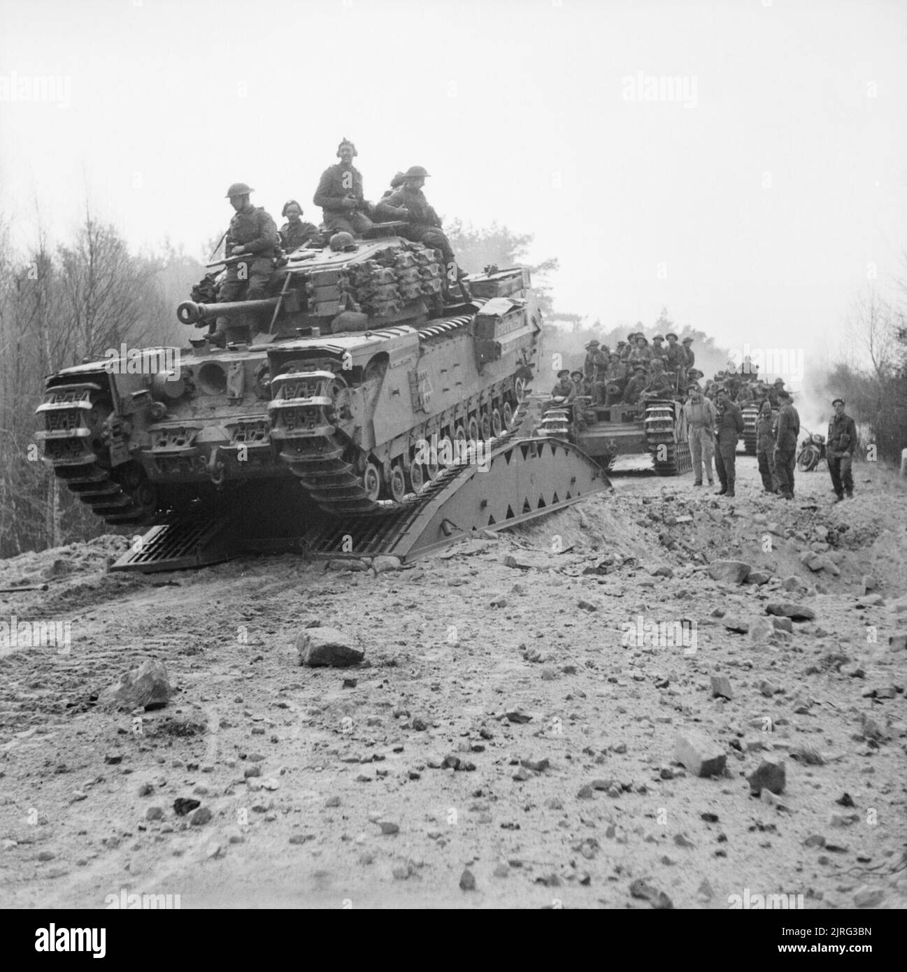 Churchill tanks of 6th Guards Tank Brigade carrying men of the 10th ...