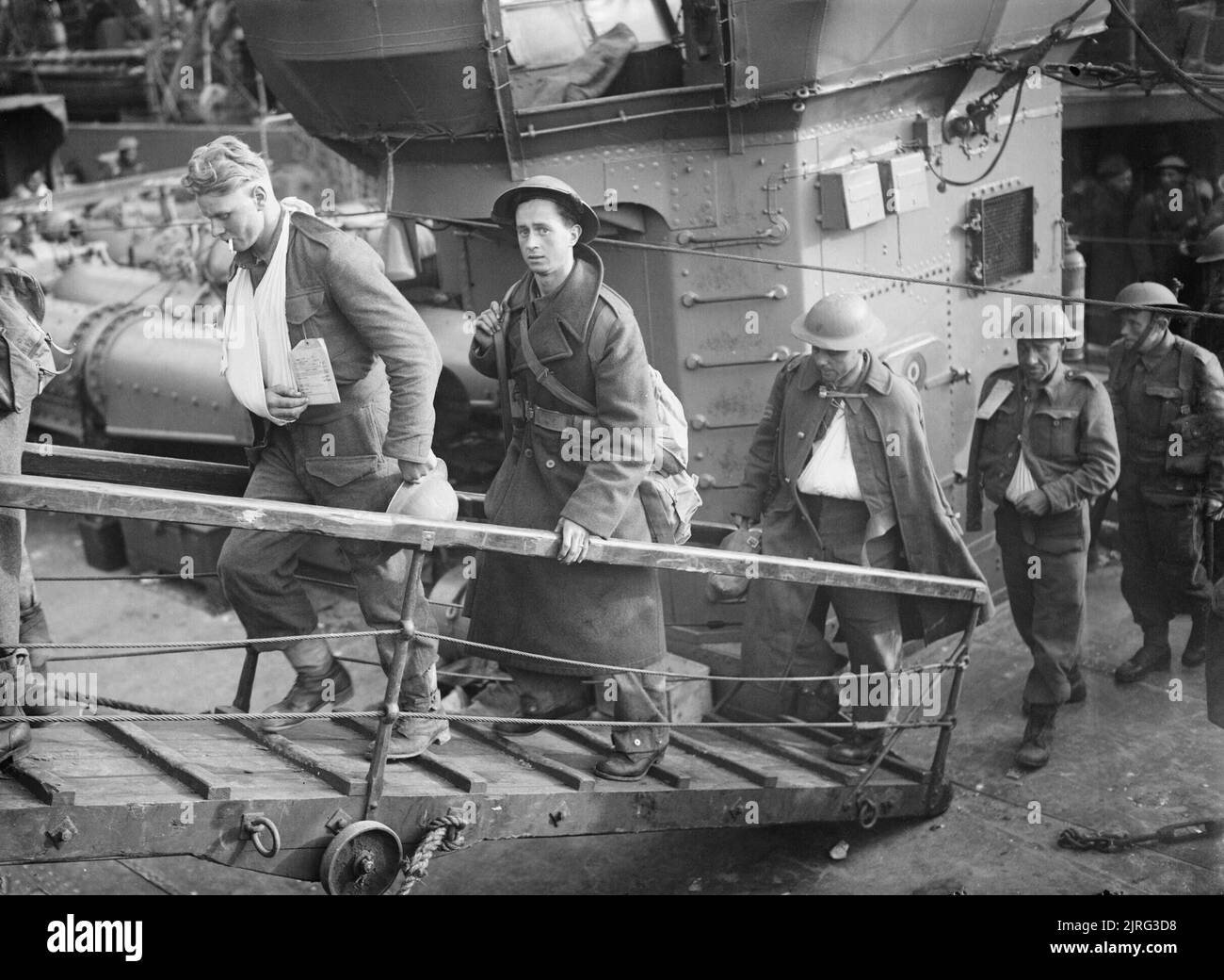 Wounded British soldiers evacuated from Dunkirk make their way up the ...