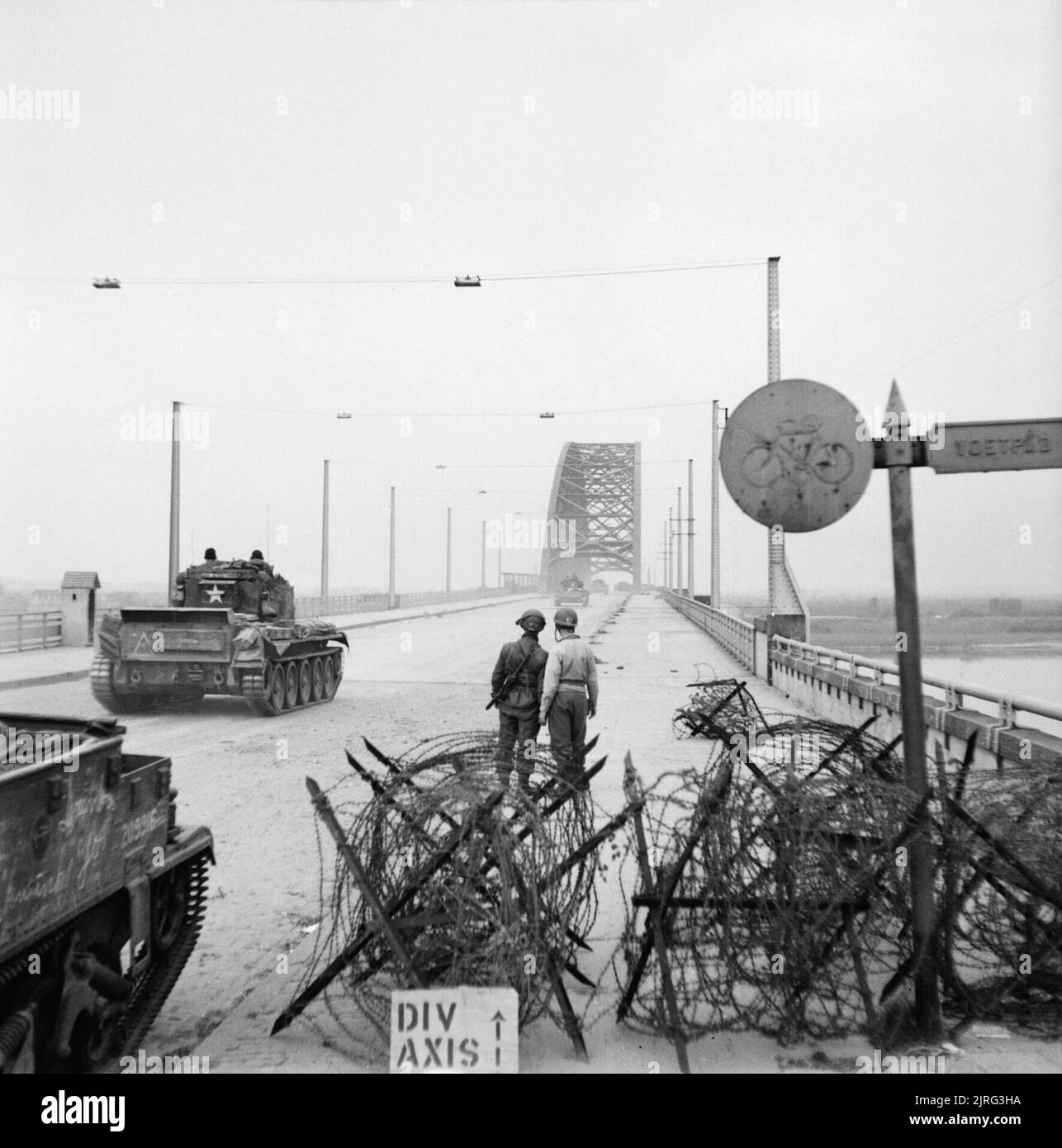 Cromwell tanks of 2nd Welsh Guards crossing the bridge at Nijmegen in ...