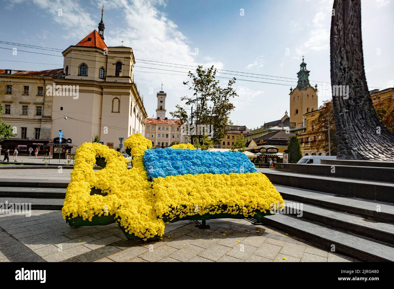 Flowerbed in form of Ukraine national emblem and flag near Taras ...