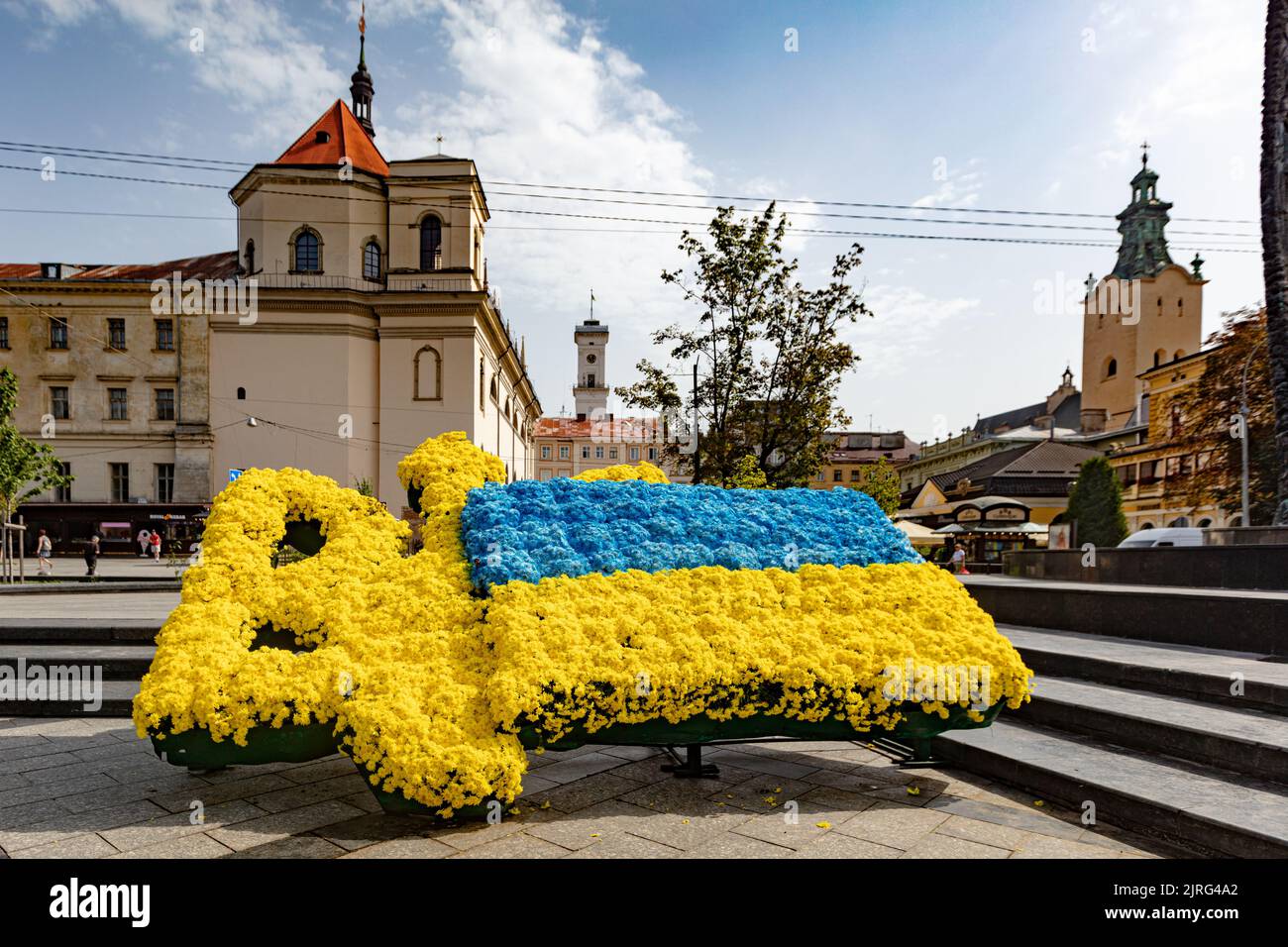 Flowerbed in form of Ukraine national emblem and flag near Taras ...