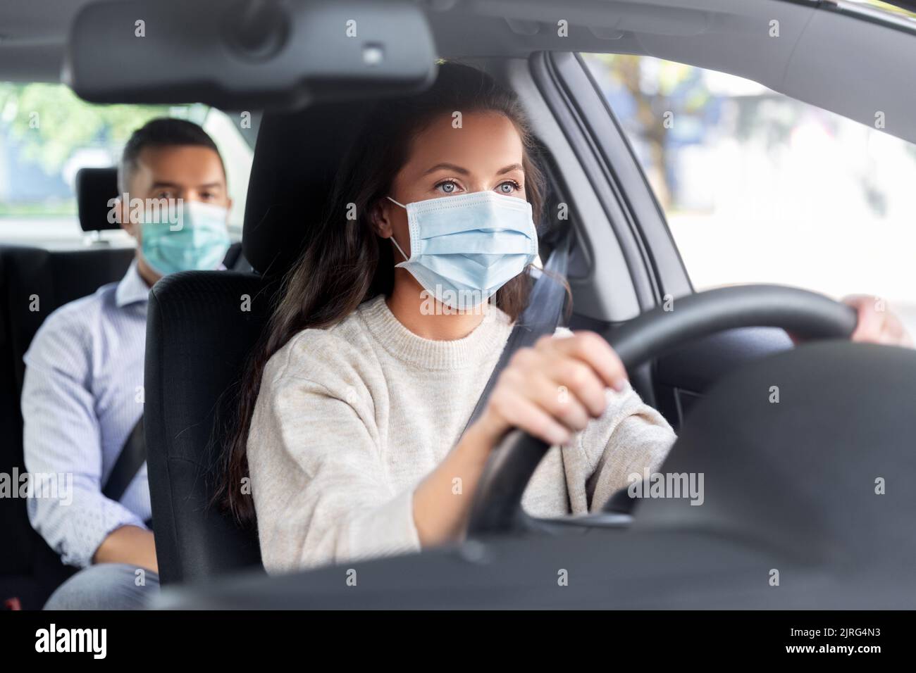 Woman driver mask car hi-res stock photography and images - Alamy