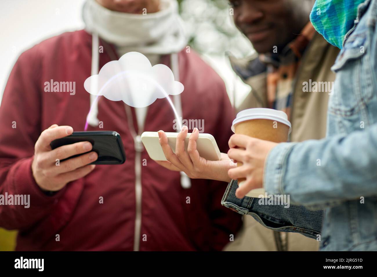 Transferring data smartphones hi-res stock photography and images - Alamy