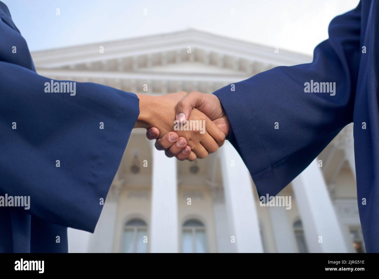handshake of graduate students or bachelors Stock Photo - Alamy