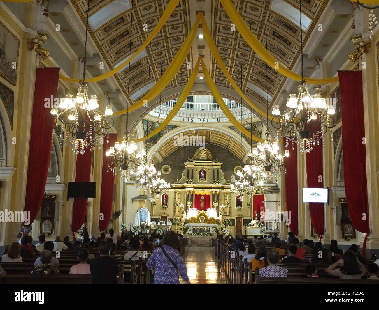 The full front view of the San Bartolome Parish Church aisle. Malabon City residents Observe the ...
