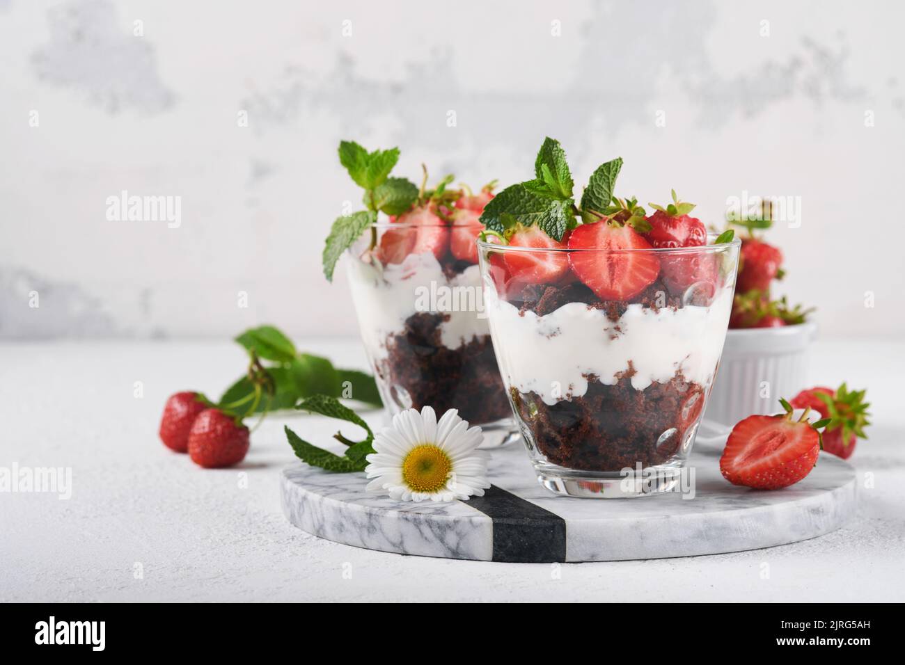 Trifles. Brownies, fresh strawberry and mascarpone cream servered in ...