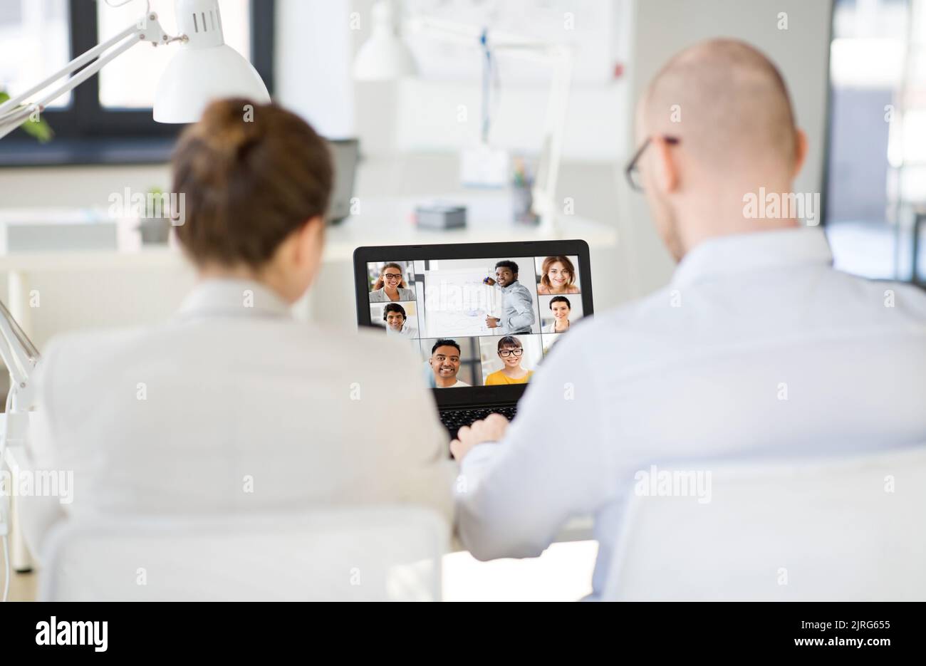 business team having video conference at office Stock Photo - Alamy