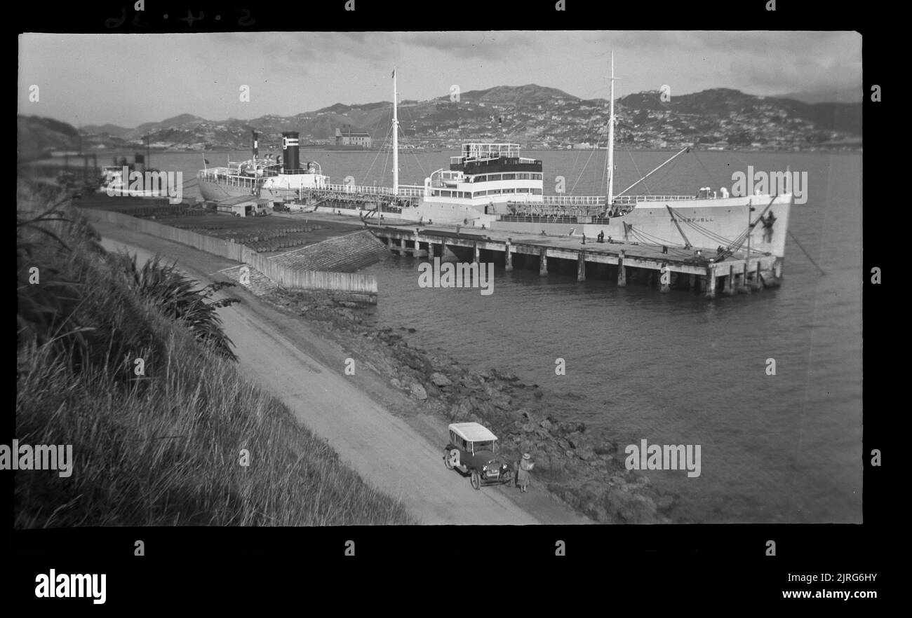 The oil wharf at Miramar with the tanker "Falkefjell" discharging cargo ...