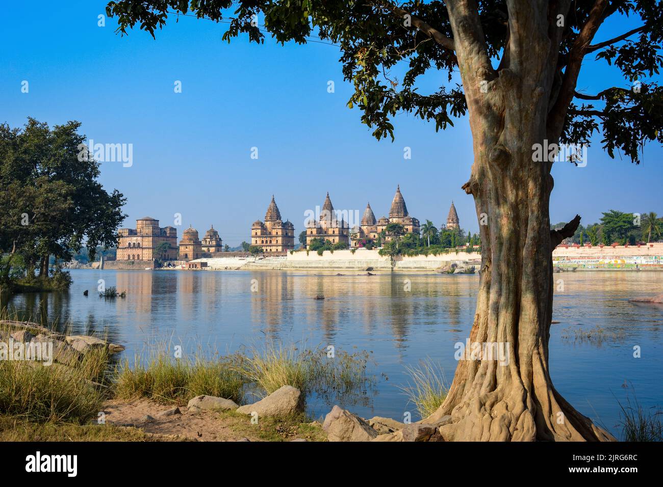 View of Royal cenotaphs of Orchha over Betwa river Stock Photo - Alamy