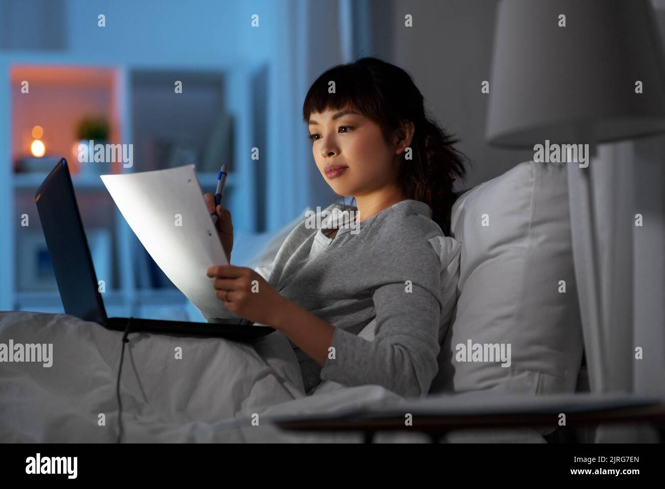 Asian woman working late night hi-res stock photography and images - Alamy
