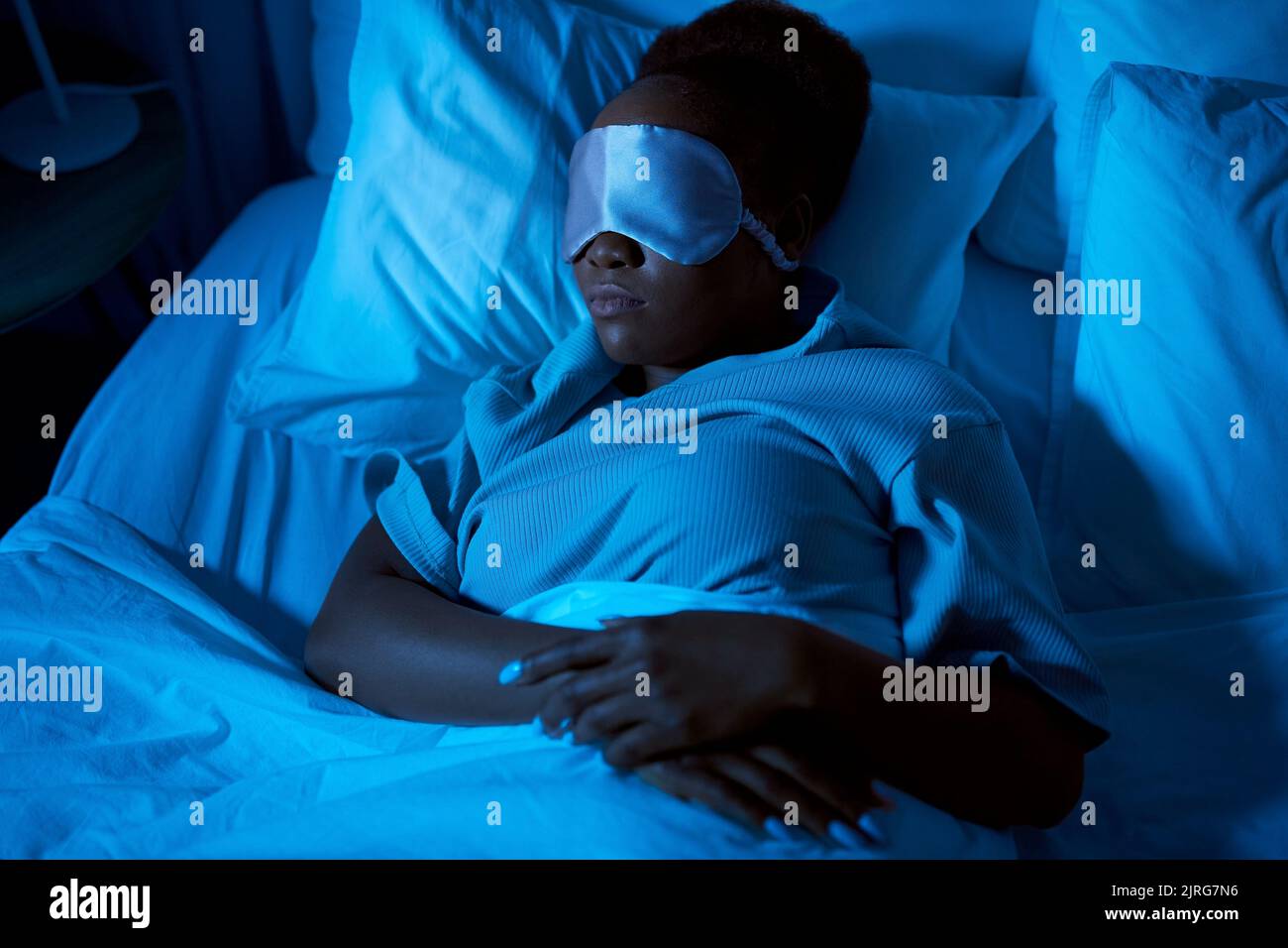 african woman sleeping in bed at home at night Stock Photo - Alamy
