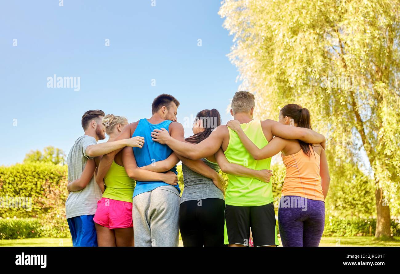 Team hugging hi-res stock photography and images - Alamy