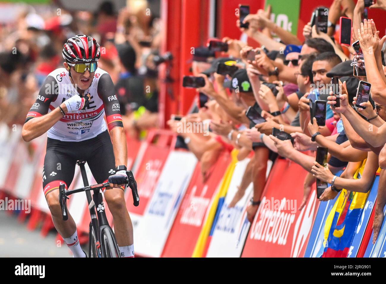 Spanish Marc Soler of UAE Team Emirates celebrates as he crosses the ...