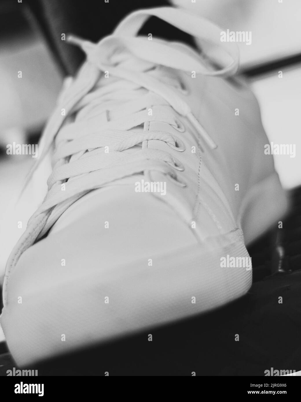 Female sneaker Black and White Stock Photos & Images - Alamy