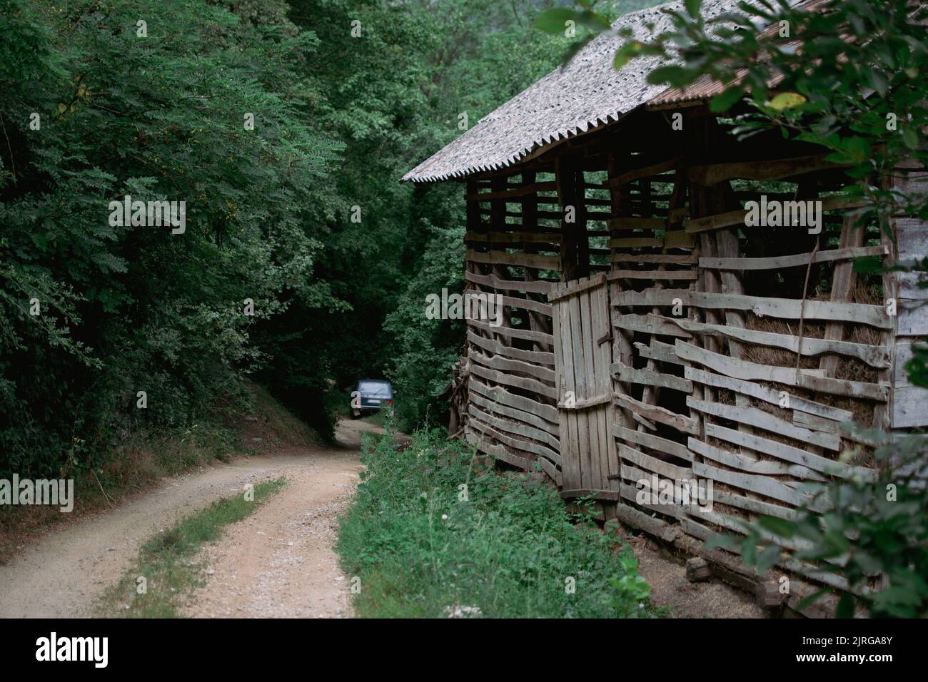 An old shack by a small road Stock Photo - Alamy