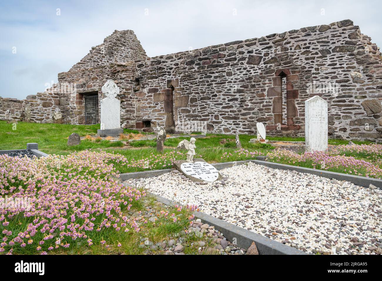 Graves inside the ruins of Ballinskelligs Abbey on the Iveragh ...