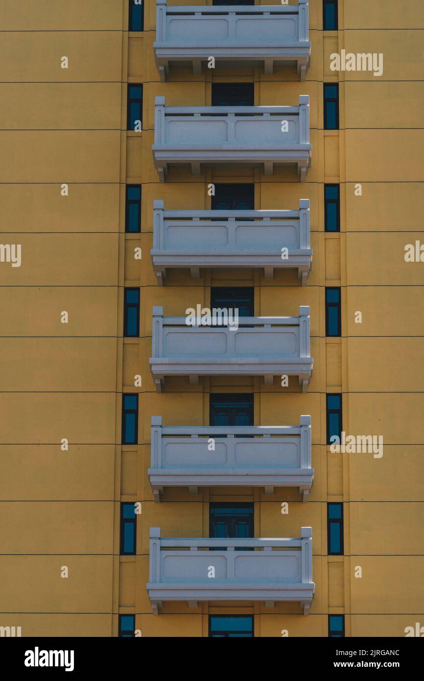 Cozy exterior balconies of multi-storey residential building Stock Photo - Alamy