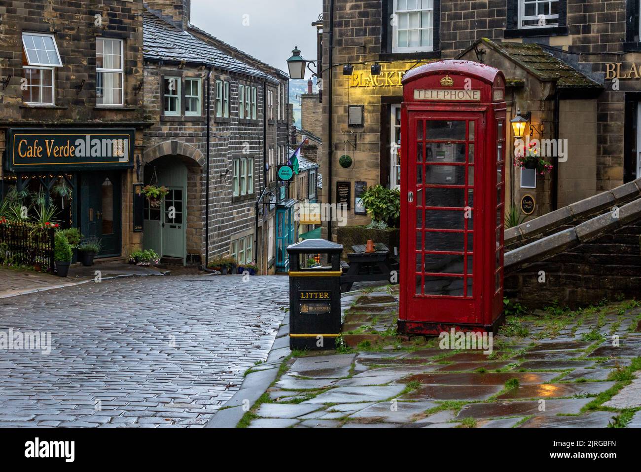 The top of Main Street, Haworth, Yorkshire. Haworth was the home of the ...