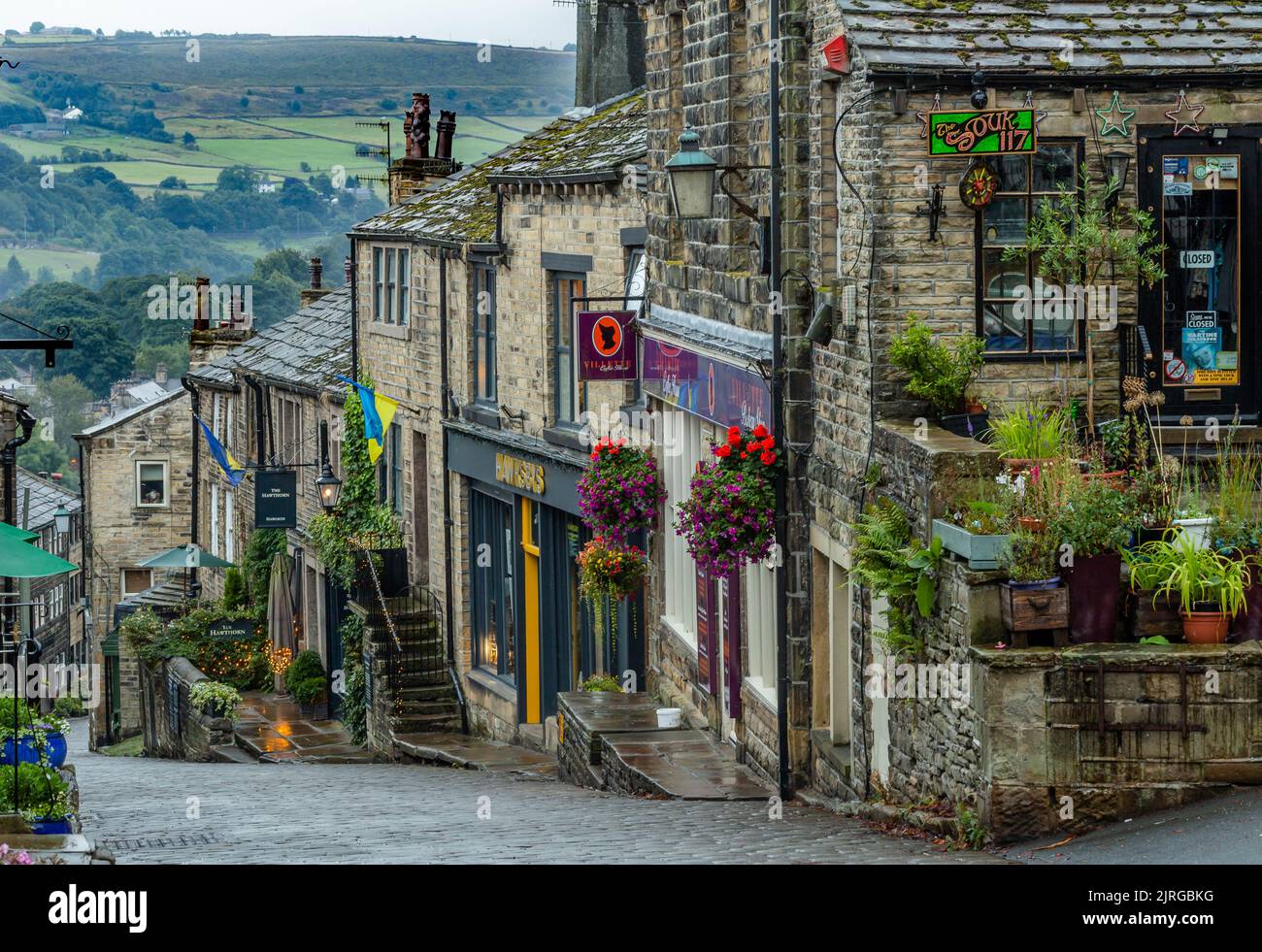 Haworth Main Street. Haworth was the home of the Bronte sisters and is ...