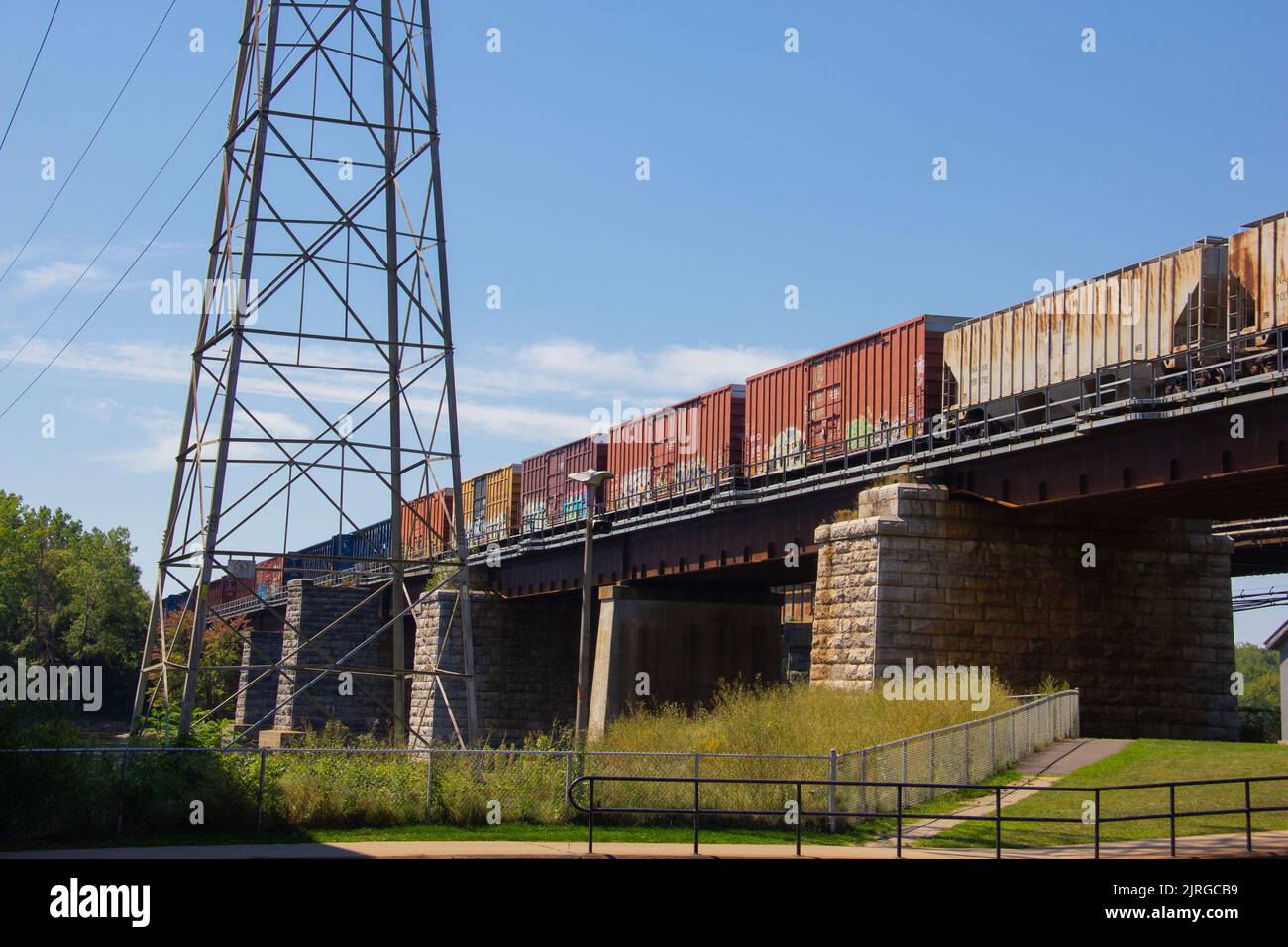 Freight train on a bridge Stock Photo - Alamy
