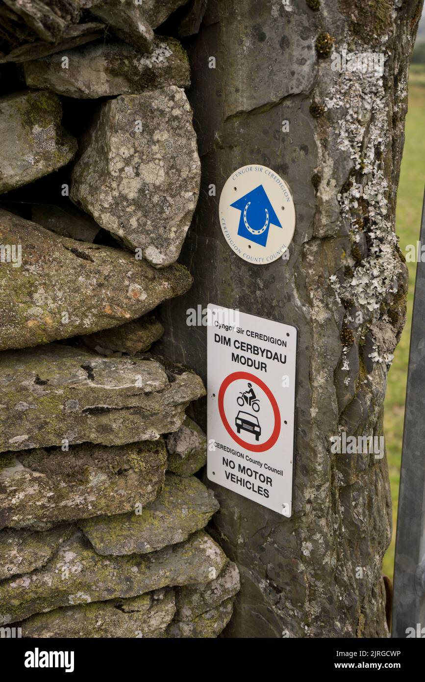 Bilingual Welsh-English sign along the a forest path in Ceredigion ...