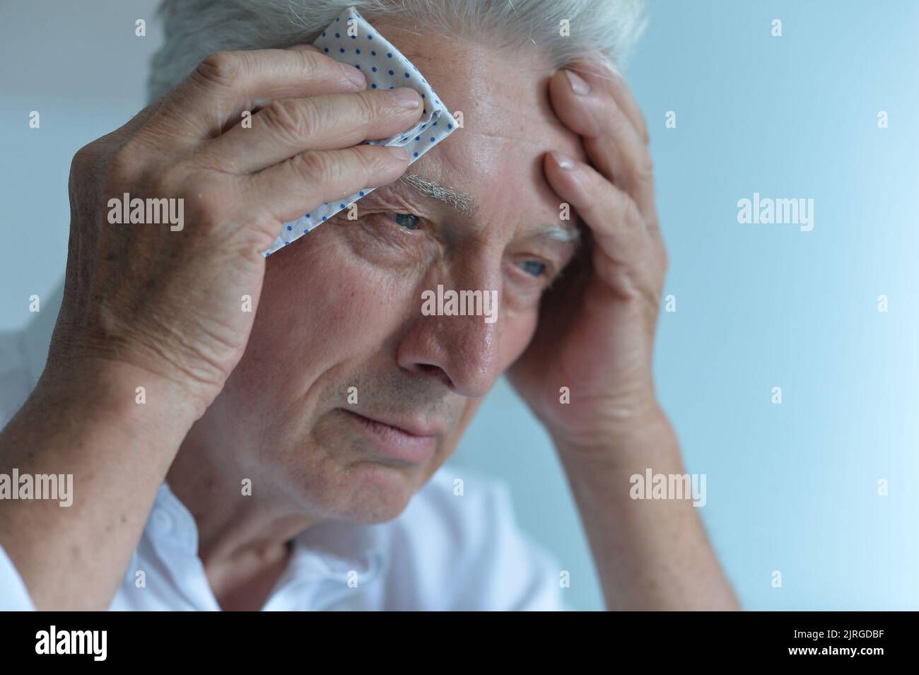 Portrait of sad sick senior man with headache Stock Photo - Alamy