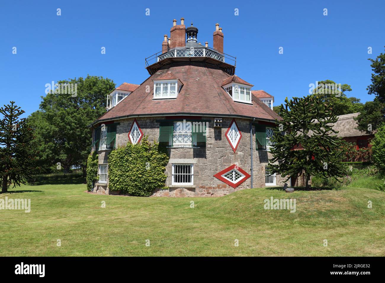 Unusual historic sixteen sided house on a beautiful sunny summers day ...