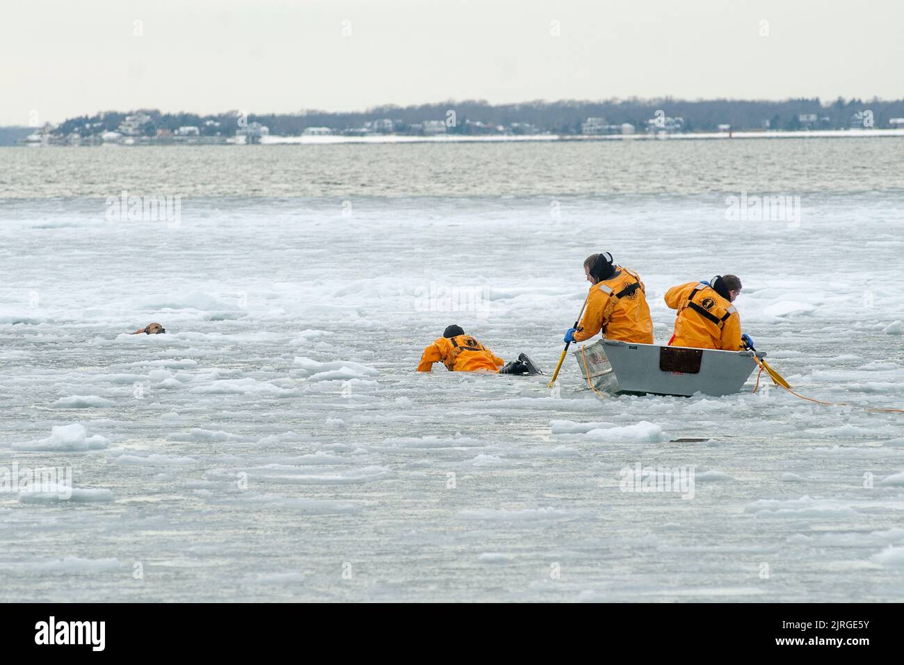 As Alex Smith and Scott Fordham of the Sag Harbor Fire Department Dive ...