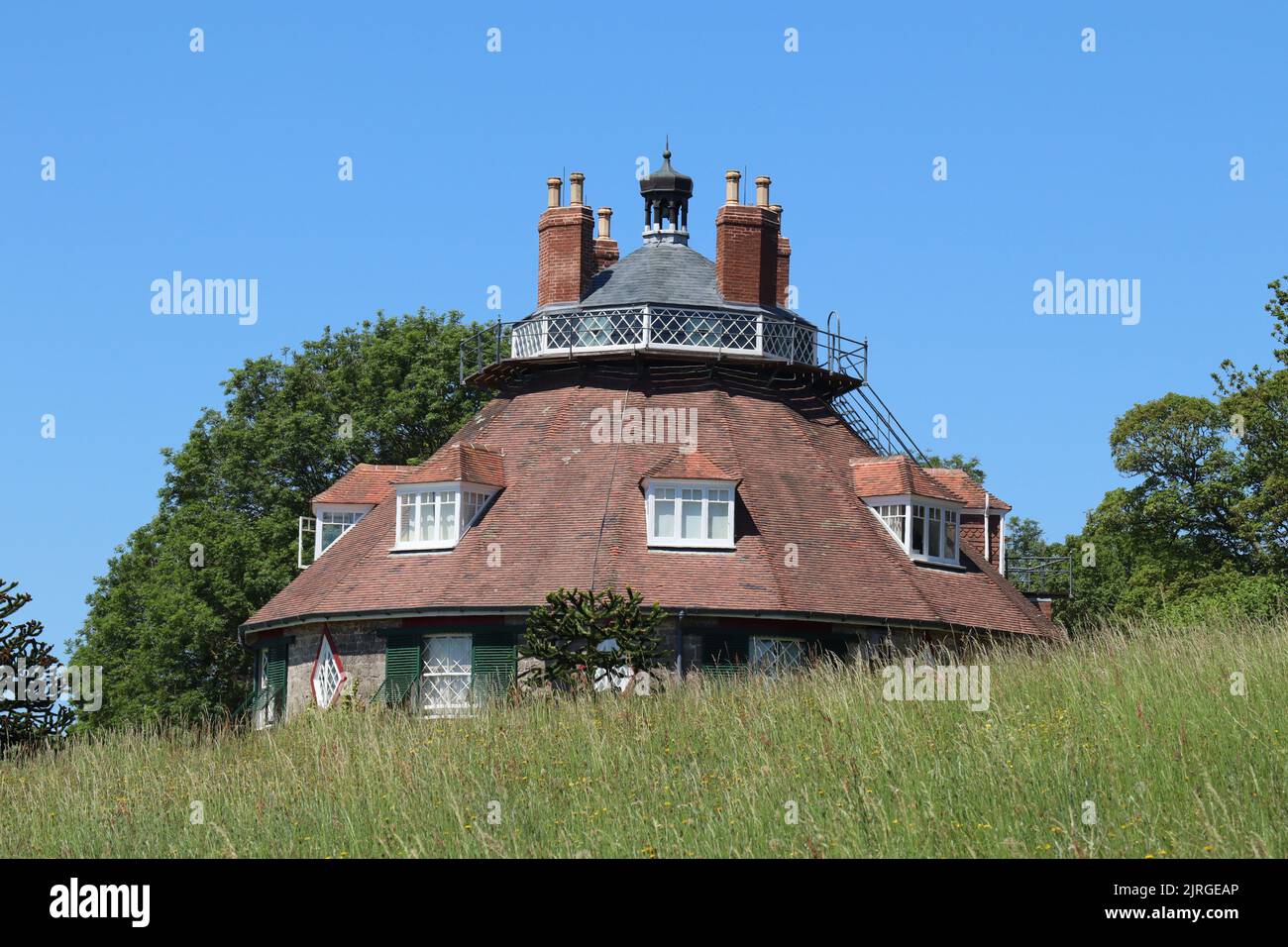The roof of an unusual historic sixteen sided house on a beautiful ...