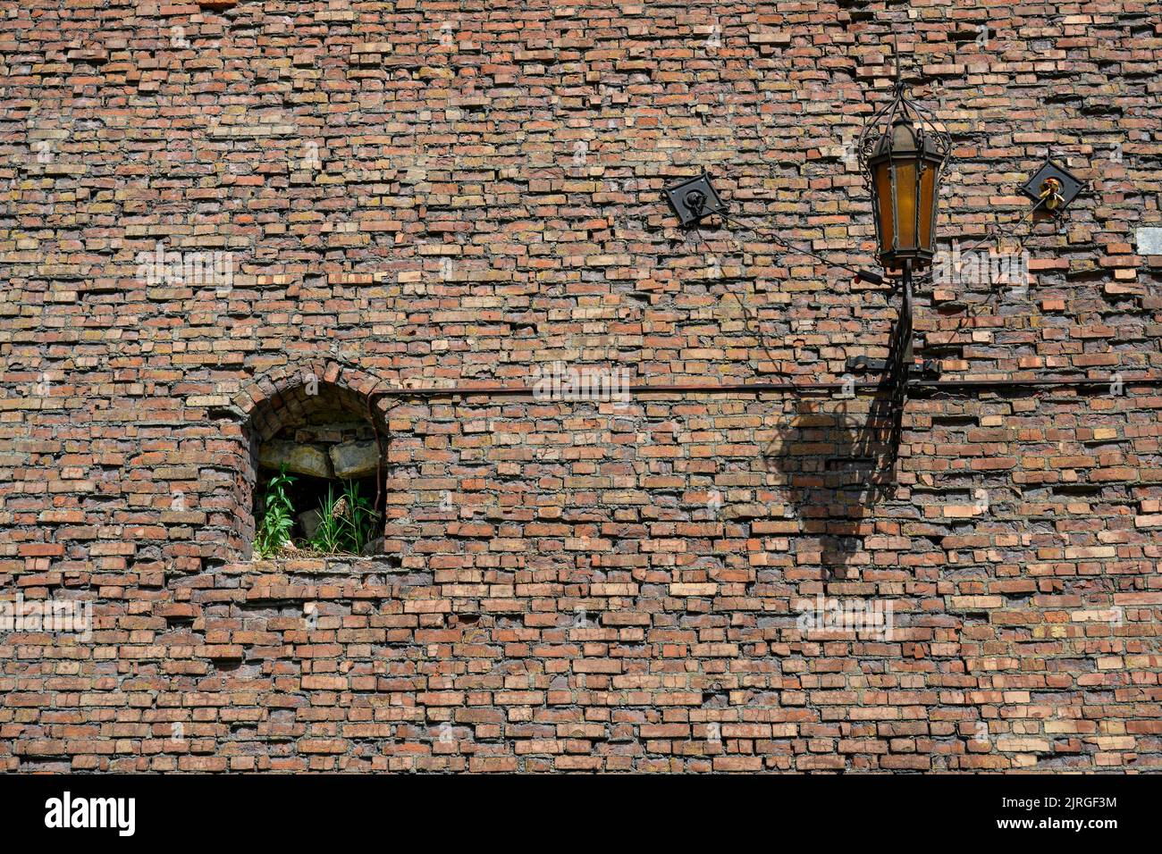Wrought iron lantern on the fortress wall of the medieval Kremlin of ...