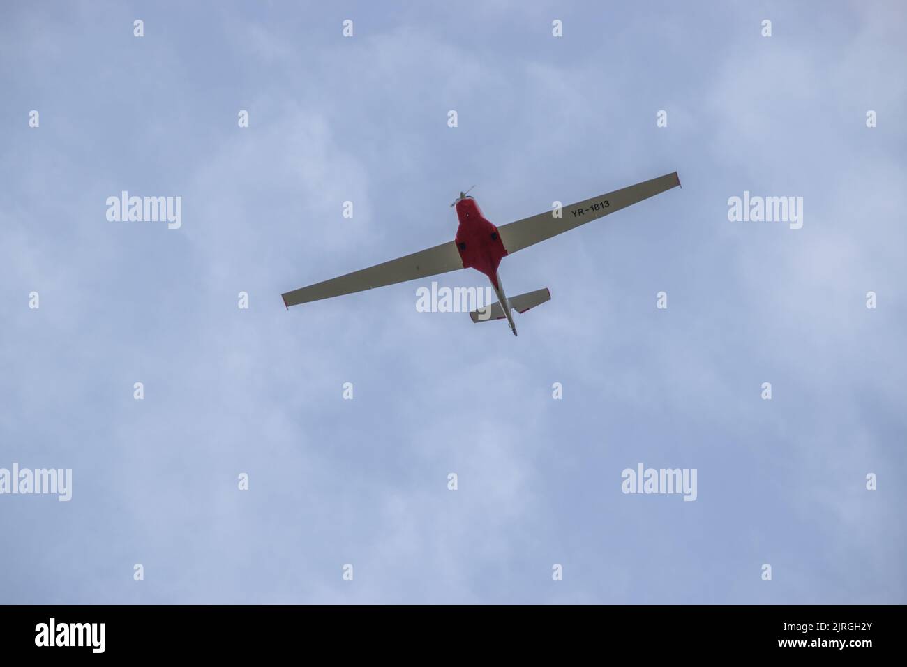 An airplane in the sky for the show at Hangariada aeronautical festival ...